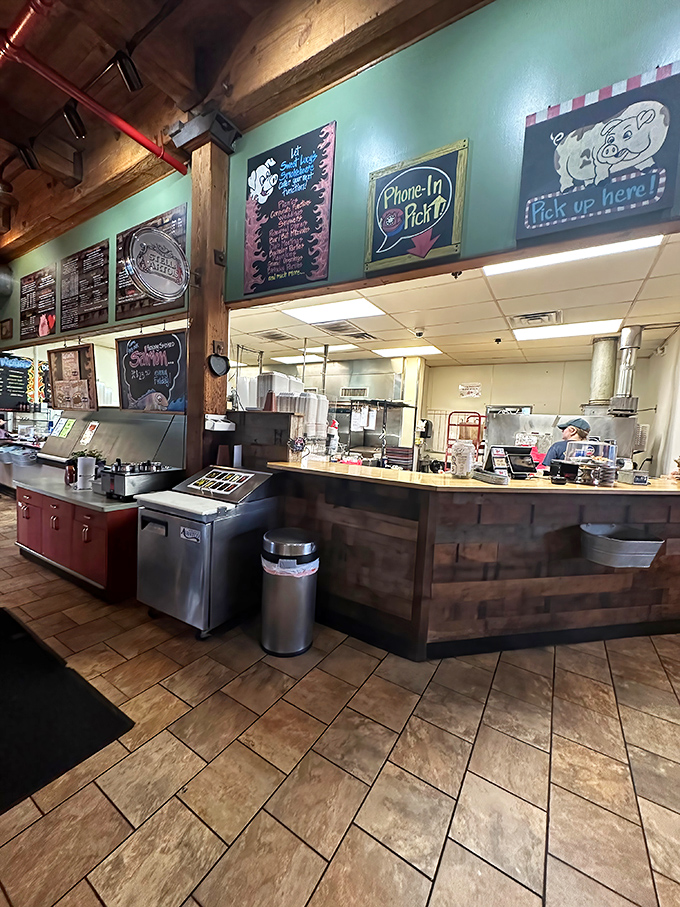 The kitchen window reveals where the real action happens – think Willy Wonka, but for carnivores.