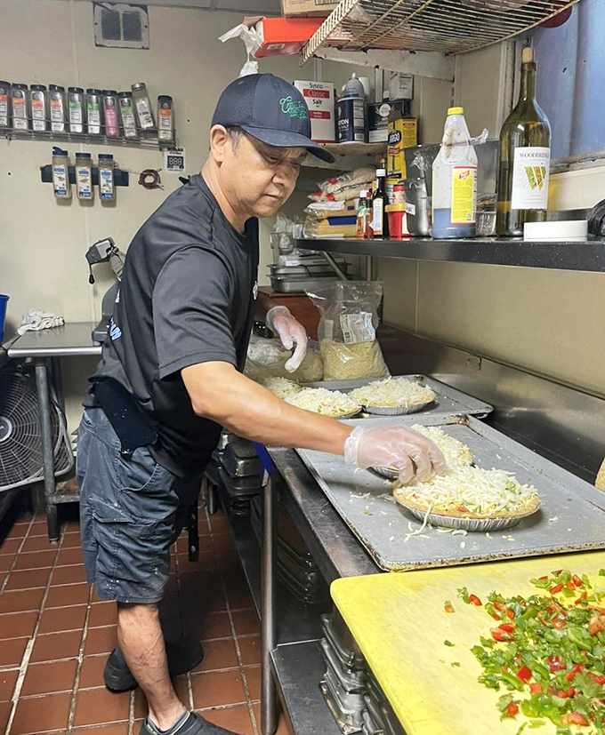 Behind every great restaurant is a dedicated kitchen magician, crafting comfort food classics with practiced hands and generous hearts.