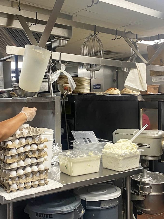 Stacks of eggs waiting to become someone's perfect morning. The kitchen reveals the scale of love that goes into feeding a community.