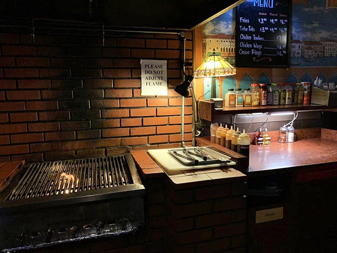 Another view of the cooking station – where the sign "PLEASE DO NOT ADJUST FLAME" has likely been ignored by countless overconfident first-timers.