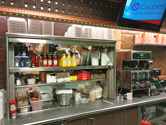 A well-organized kitchen humming with the rhythm of made-to-order comfort food preparation.