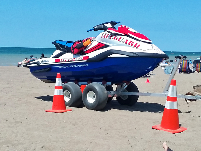 Lifeguard equipment stands ready on Pennsylvania's freshwater shores, where safety comes with wheels big enough to navigate any beach terrain.