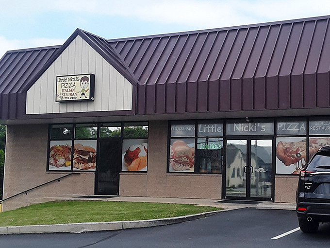 Little Nicki's Pizza tempts passersby with window displays that make "I'll just grab a quick slice" the biggest lie you'll tell yourself today.
