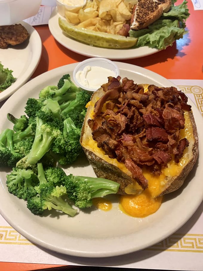 This loaded baked potato with broccoli is what happens when vegetables and comfort food call a delicious truce on your plate.