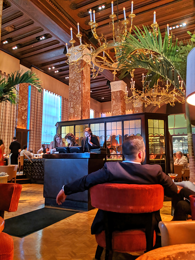 Marble columns and palm fronds create the perfect backdrop for a meal that bridges old-world elegance with modern indulgence.