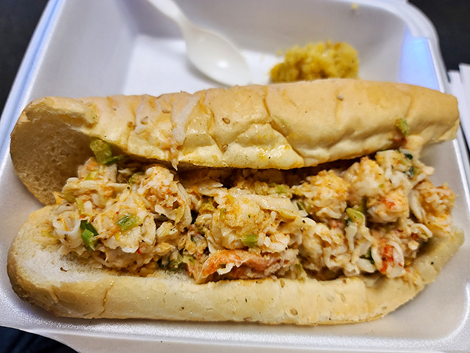 A sandwich bursting with what appears to be creamy, seasoned meat&mdash;proof that Saddleback's talents extend beyond traditional barbecue offerings.