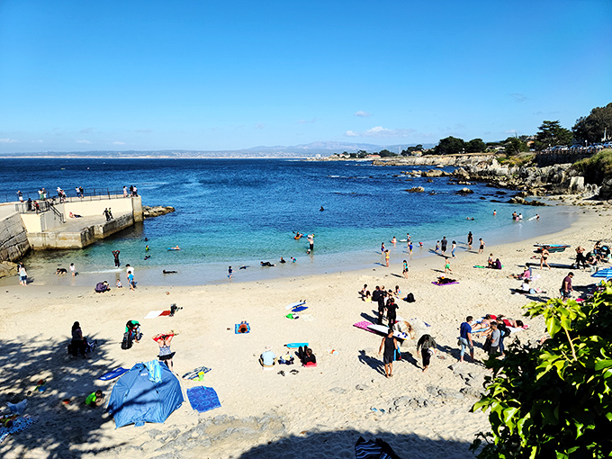 Lovers Point Beach buzzes with the happy chaos of families discovering that paradise doesn't require a passport or currency exchange.