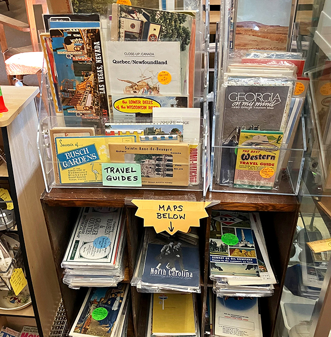 Vintage travel guides promising adventures from a bygone era. "See Busch Gardens for just $2.50!" might be the most heartbreaking thing you'll read today.