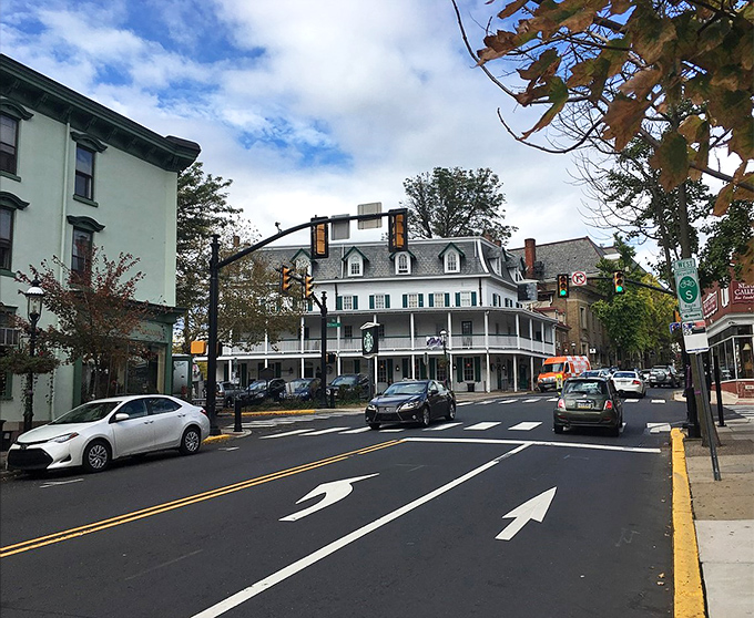 Doylestown's Main Street intersection captures the essence of American small-town life, where historic buildings frame everyday moments with timeless elegance.