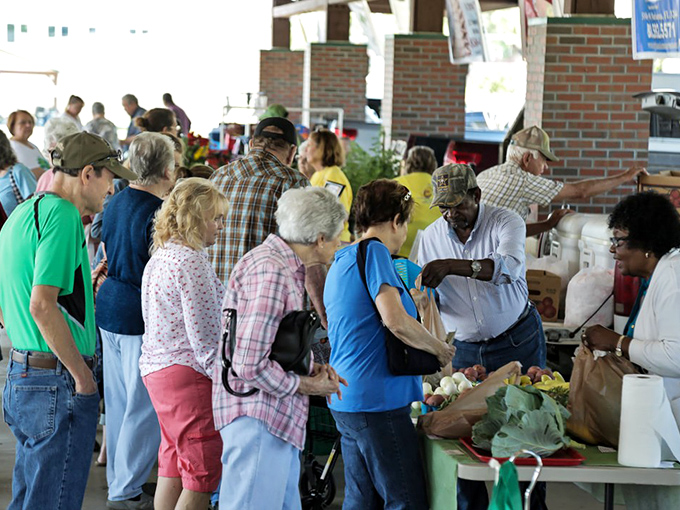 The Farmer's Market brings neighbors together over homegrown tomatoes and handshake deals&mdash;social networking, small-town style.