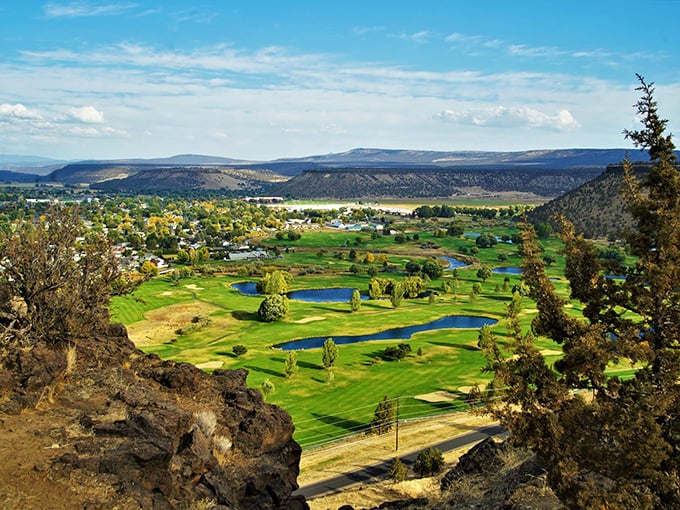 Championship golf unfolds against mountain backdrops that make every round feel like vacation.