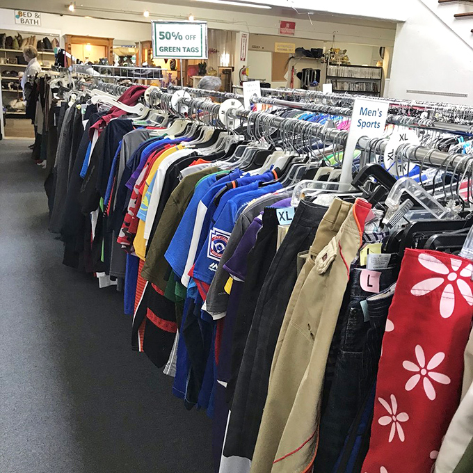 The men's department rivals any department store for organization, proving secondhand shopping doesn't mean sacrificing the dignified browsing experience.