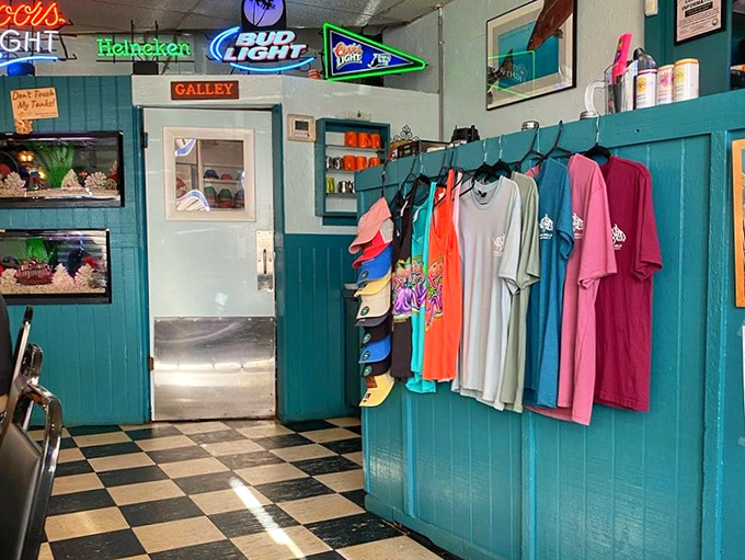 Keegan's merchandise wall &ndash; because sometimes you need a t-shirt to prove you've discovered one of Florida's seafood treasures.