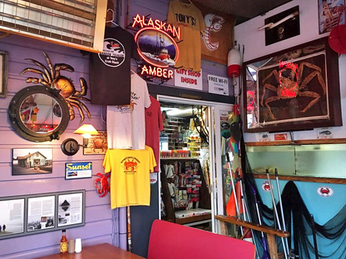 The walls tell stories of ocean adventures. Colorful memorabilia, neon signs, and crab-themed everything create a seafood lover's happy place.