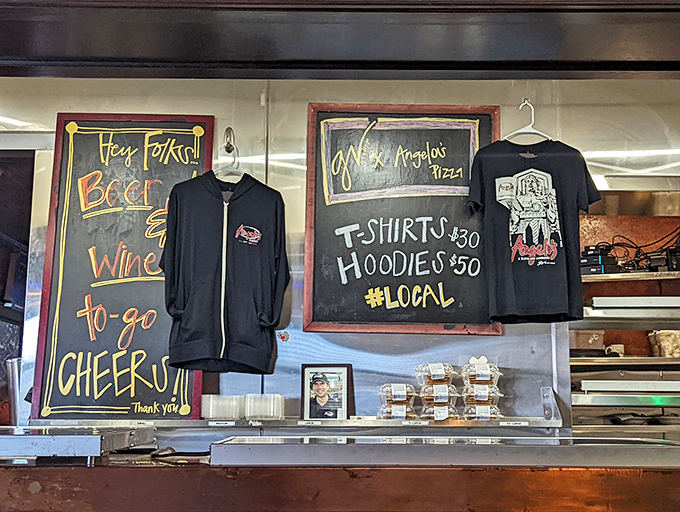 Local pride on display. When your pizza place has merch, you know it's transcended from restaurant to cultural institution.