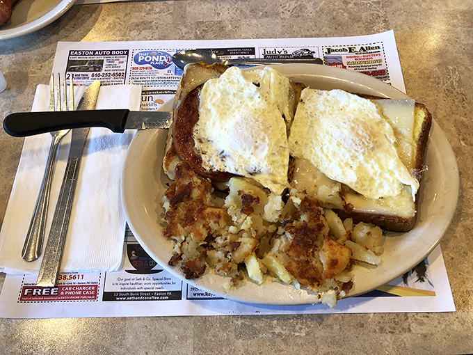 Breakfast that means business&mdash;two perfectly fried eggs atop toast with a mountain of home fries. The breakfast of champions who plan to nap later.