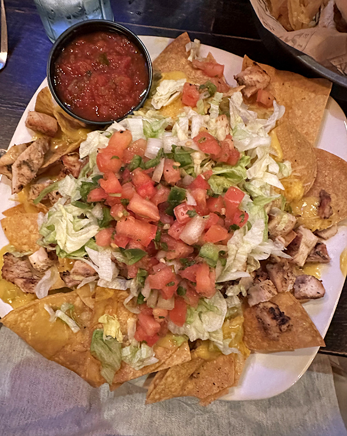 Nachos piled high enough to require structural engineering knowledge and a solid game plan for sharing.