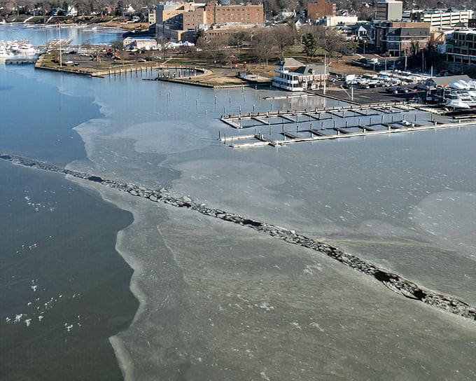 Winter's grip on the Navesink creates fascinating ice patterns, a seasonal transformation that locals have witnessed for generations.