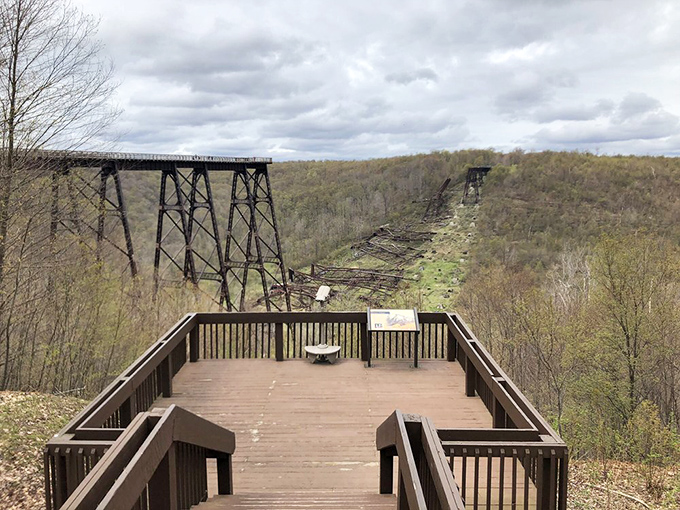 Where destruction becomes art. The observation deck offers a perfect vantage point to appreciate both the standing and collapsed sections of the historic bridge.