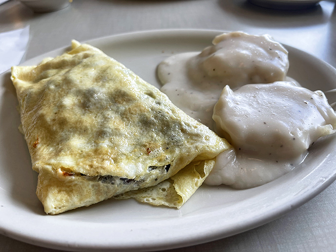 An omelet that doesn't need fancy French techniques, just honest cooking. Those biscuits and gravy could settle family feuds.