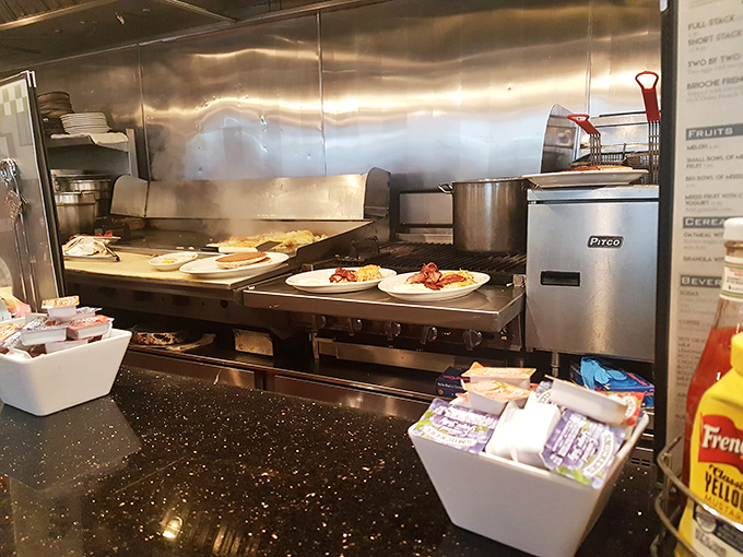 Plates emerge from the pass like edible artwork, each one a testament to griddle mastery and timing.