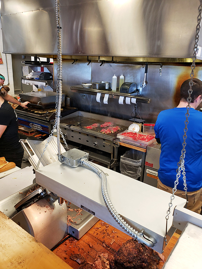 The kitchen ballet&mdash;where skilled hands transform simple ingredients into edible art with practiced precision and zero wasted motion.