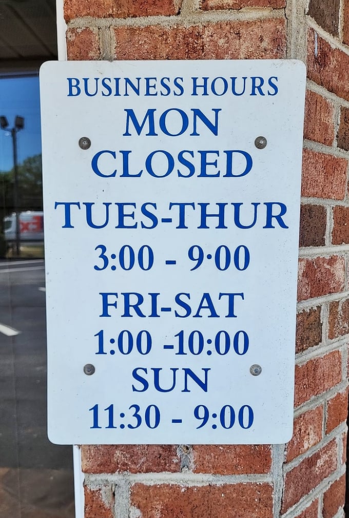 Hours posted clearly because they know you'll be planning your week around your next visit. Monday's closure gives the chef time to dream up new specials.