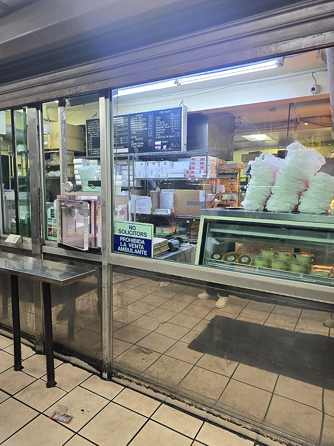 The ordering window&mdash;a portal to pleasure where dreams of crispy chicken and sides become delicious reality.