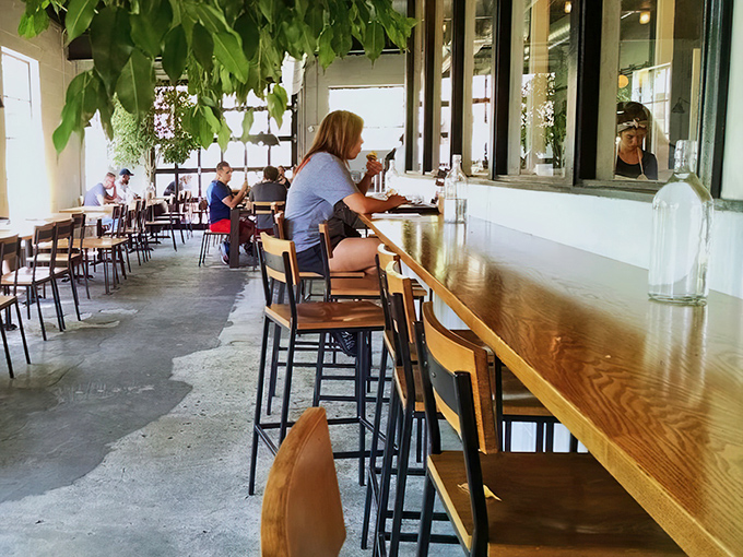 Counter culture at its finest. The wooden bar offers front-row seats to the coffee-making performance, with natural light pouring in from generous windows.