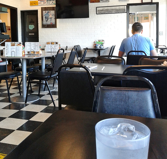 Empty tables that won't stay that way for long. In the diner universe, a vacant seat is merely taking a brief intermission.