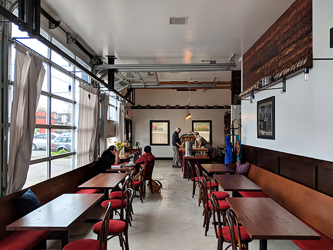 Exposed beams and warm lighting create an atmosphere that's both industrial and incredibly welcoming.