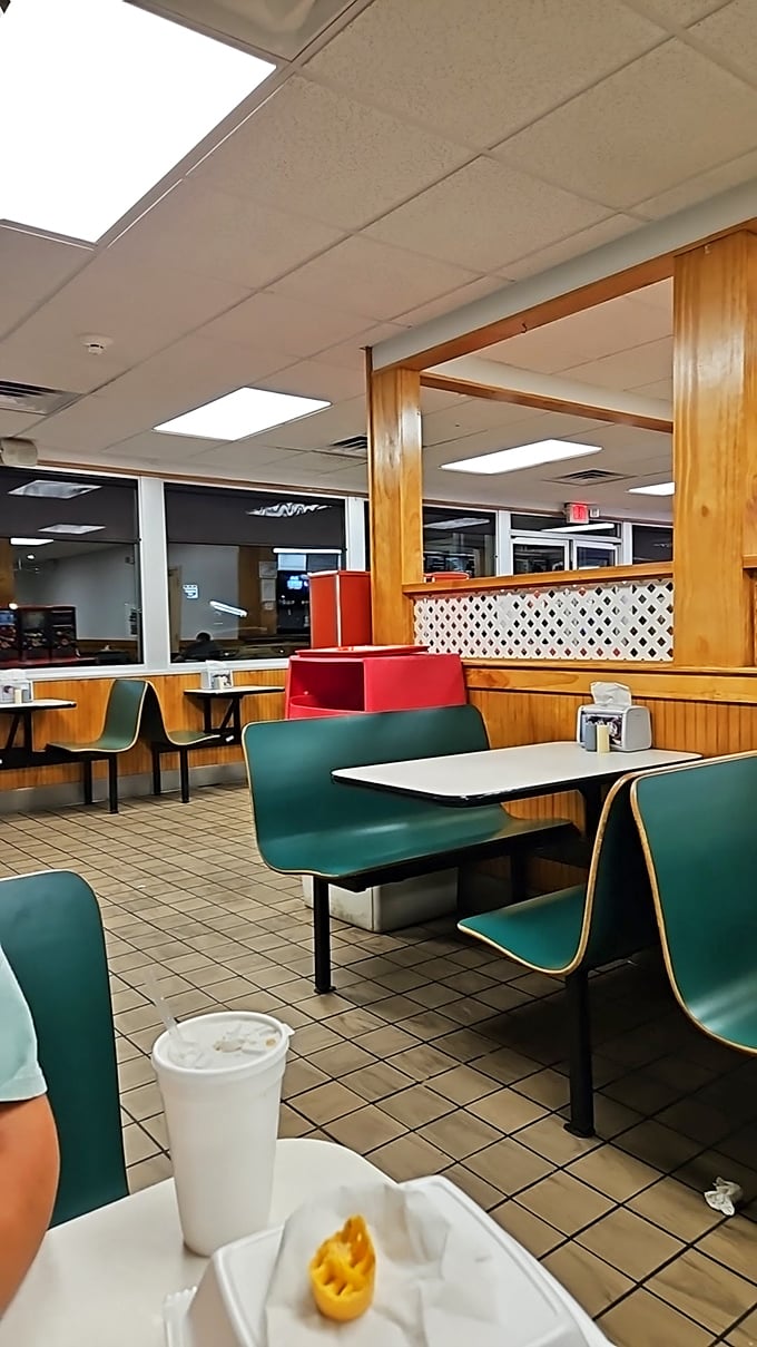 Simple pleasures in turquoise and wood &ndash; booths designed for focusing on what matters: the food and the company you're sharing it with.