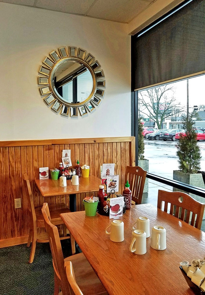Sunlight streams through windows onto wooden tables where coffee mugs wait patiently to become your morning's best friend.