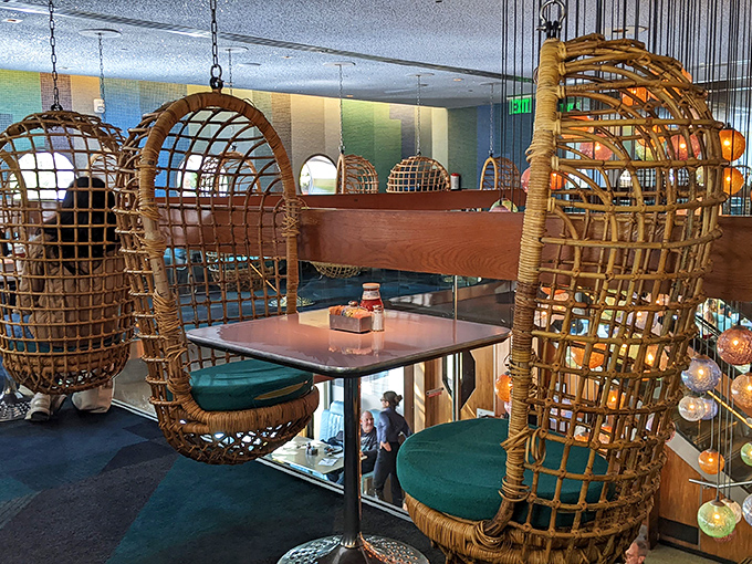 Those famous hanging basket chairs aren't just seating—they're conversation pieces where you can literally swing while you sip.