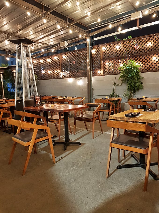 String lights and wooden lattice transform the patio into an intimate dining space that feels miles away from Sunset Boulevard's hustle.
