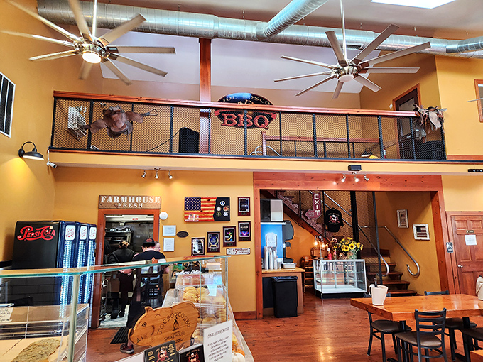 The loft space and industrial touches blend surprisingly well with the warm yellow walls&mdash;like how a touch of vinegar brightens up a rich barbecue sauce.