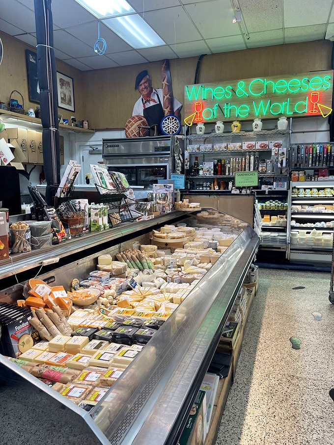 The "Wines & Cheeses of the World" sign glows like a beacon of hope in a world of processed cheese singles.