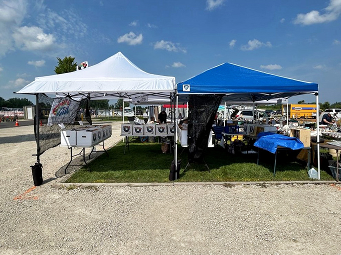 Pop-up tents create impromptu showrooms where vendors display their wares under the wide Illinois sky.