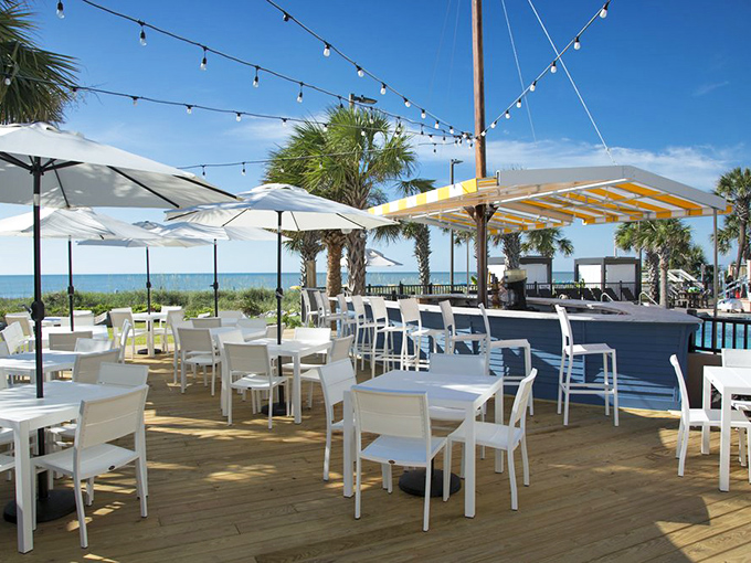 The outdoor deck offers the ultimate Myrtle Beach dining experience&mdash;fresh air, ocean breezes, and the sound of waves providing nature's own dinner music.
