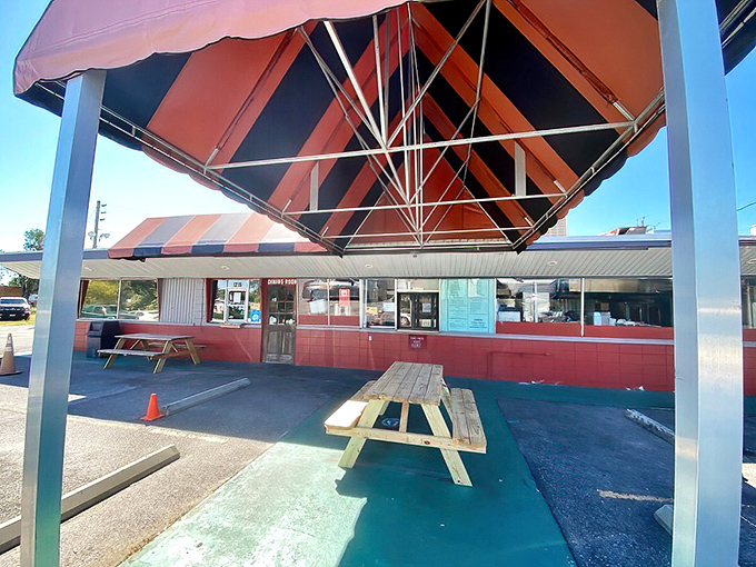 The covered outdoor seating area offers a perfect spot for enjoying smoky treasures while watching Lakeland life unfold around you.