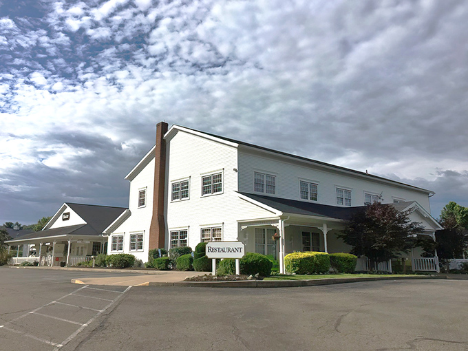 Even under moody skies, the white clapboard building stands proud. This isn't just a meal stop—it's a destination worth the journey.