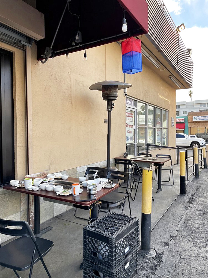 Even the outdoor seating area comes equipped with banchan and heaters&mdash;because good Korean BBQ waits for no weather.