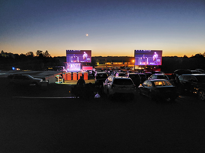 Two screens light up the night sky, doubling your entertainment options while stars twinkle their approval from above.