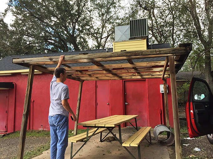 Rustic outdoor seating that says, "We spent our money on the hot dogs, not the furniture"&mdash;and that's exactly as it should be.
