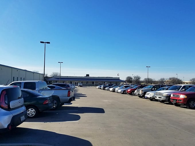 Treasure hunter central. The packed parking lot tells the story of the Outlet's popularity among Fort Worth's savvy shoppers and resellers.