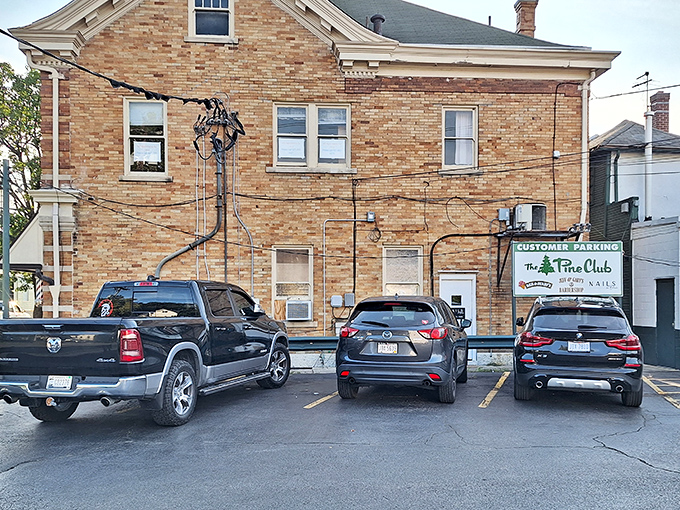 The unassuming parking area behind The Pine Club &ndash; where countless diners have arrived hungry and departed in a state of blissful satisfaction.