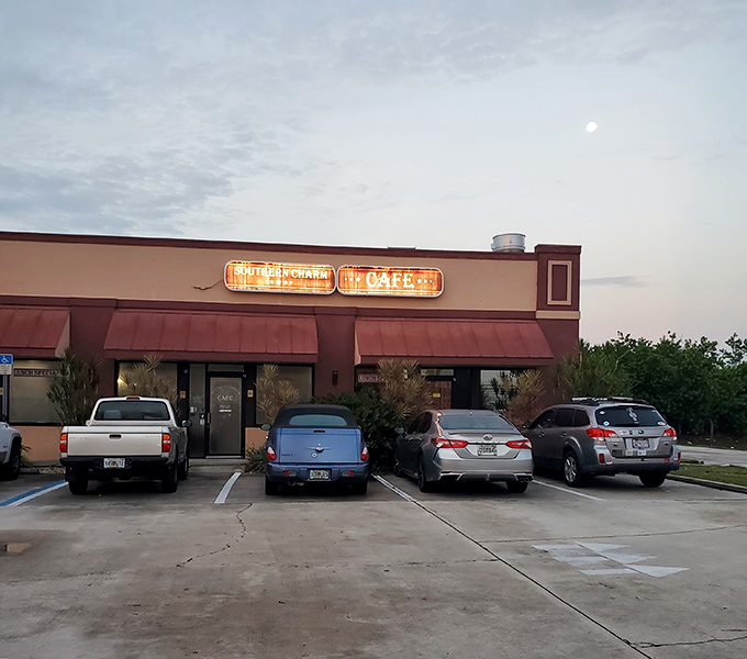 Even at dusk, the illuminated sign serves as a beacon for hungry travelers &ndash; the parking lot never stays empty for long.