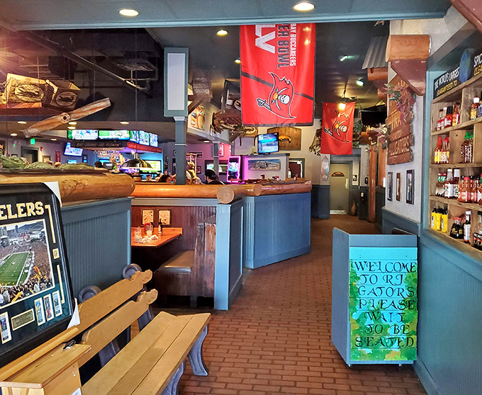 The pathway through RJ Gator's reveals a thoughtfully designed space where every booth feels like the best seat in the house.
