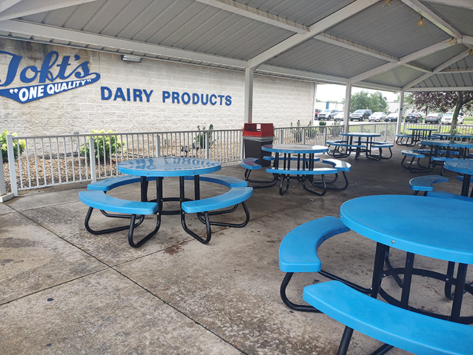 The covered patio with signature blue tables offers the perfect setting for the sacred ritual of ice cream enjoyment.