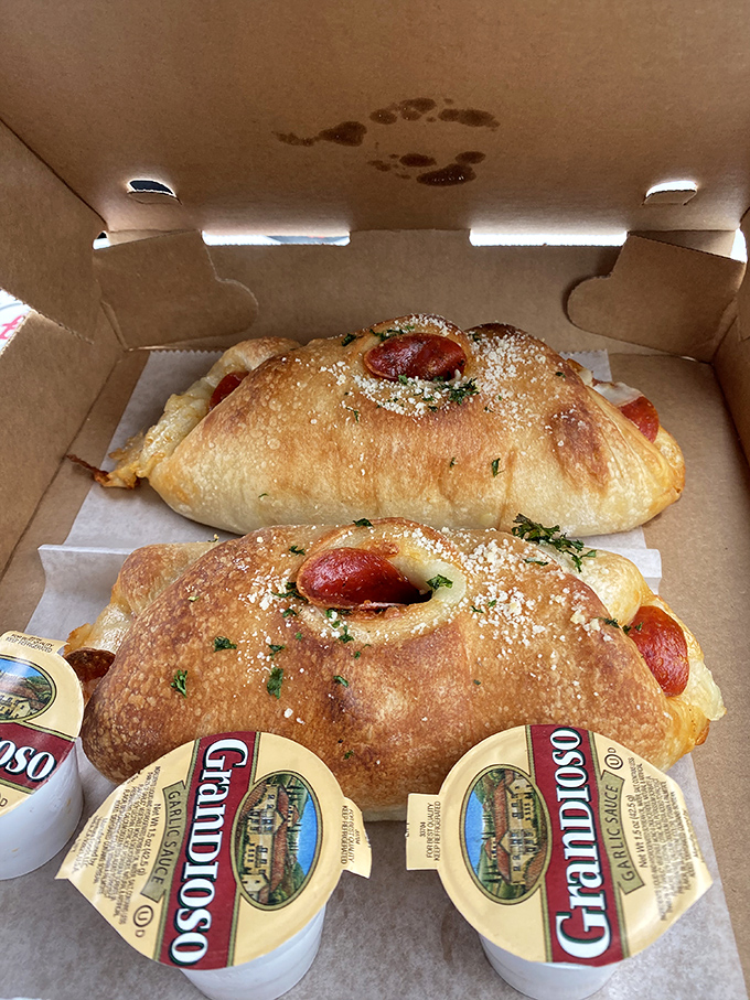 These pepperoni rolls aren't just food&mdash;they're edible treasure chests with golden-brown exteriors hiding savory secrets within. Parmesan fairy dust included.